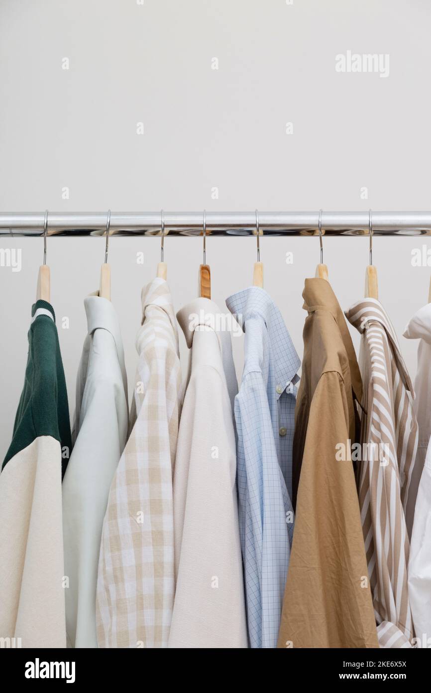 Clothes rack - Capsule minimal wardrobe background Stock Photo - Alamy