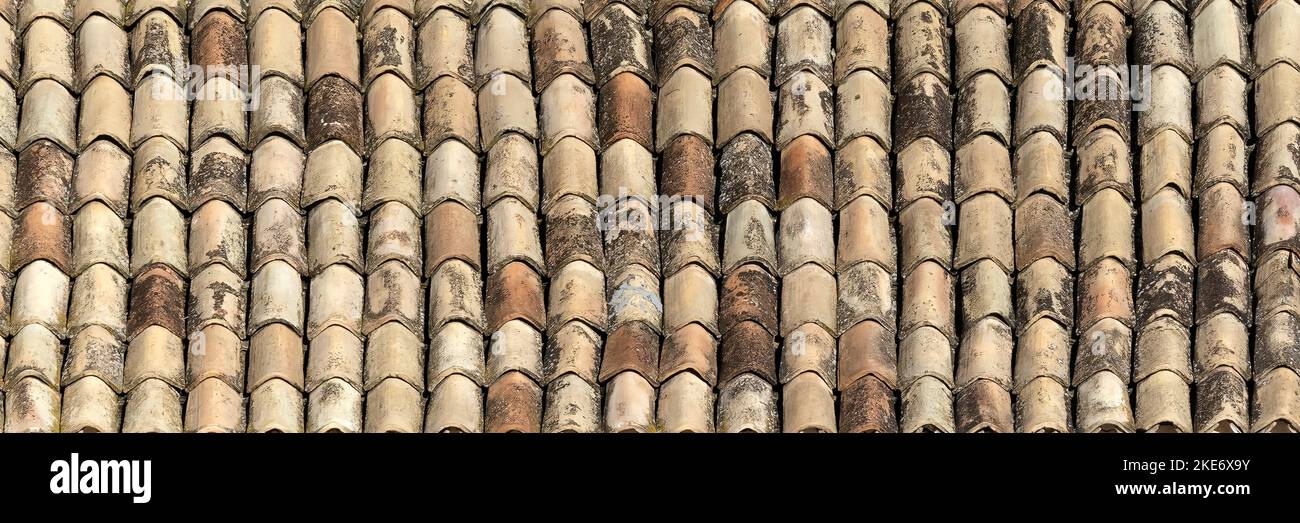 BACKGROUND TEXTURE - Terracotta roof tiles on a house in panorama ...