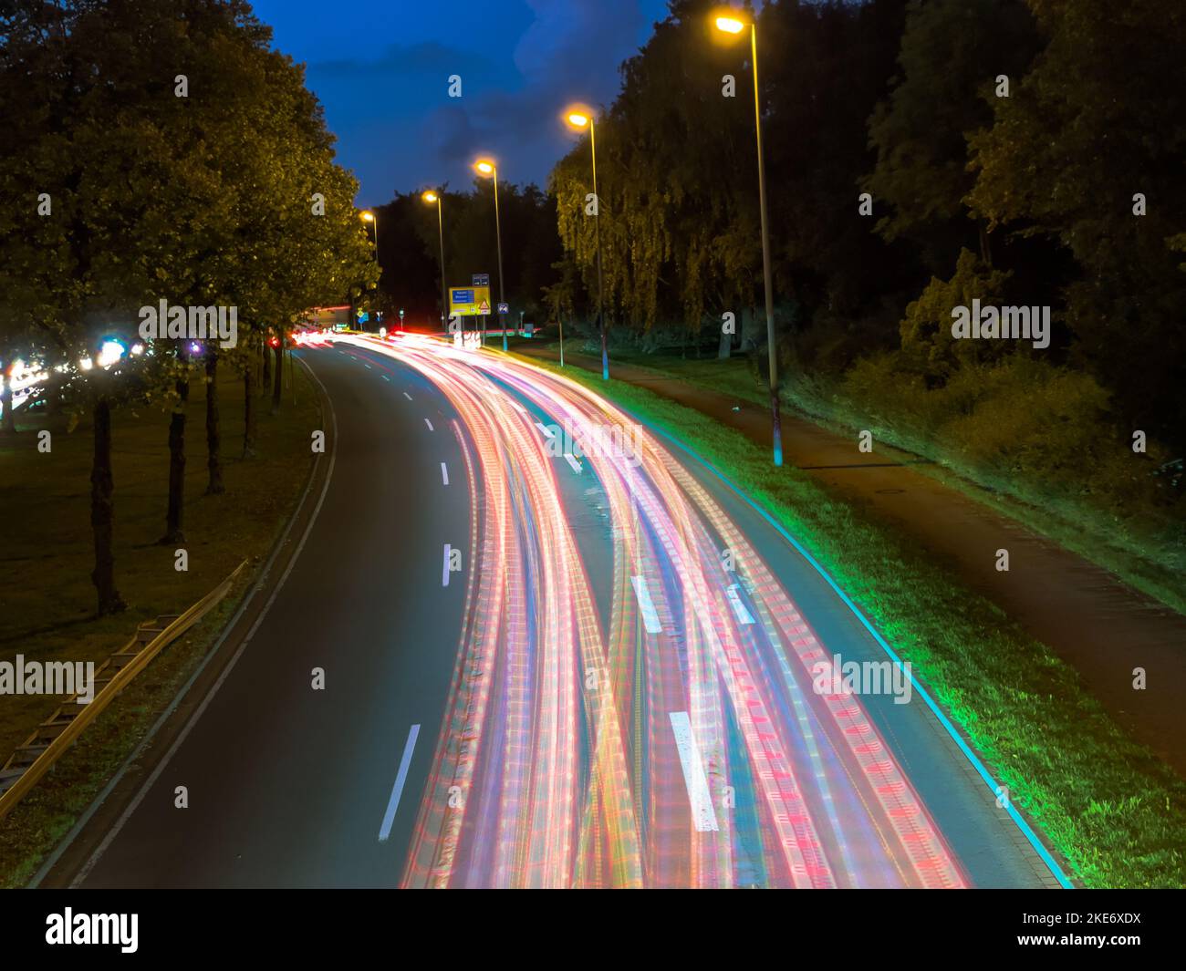 light trails left from traffic on motorway during night Stock Photo - Alamy