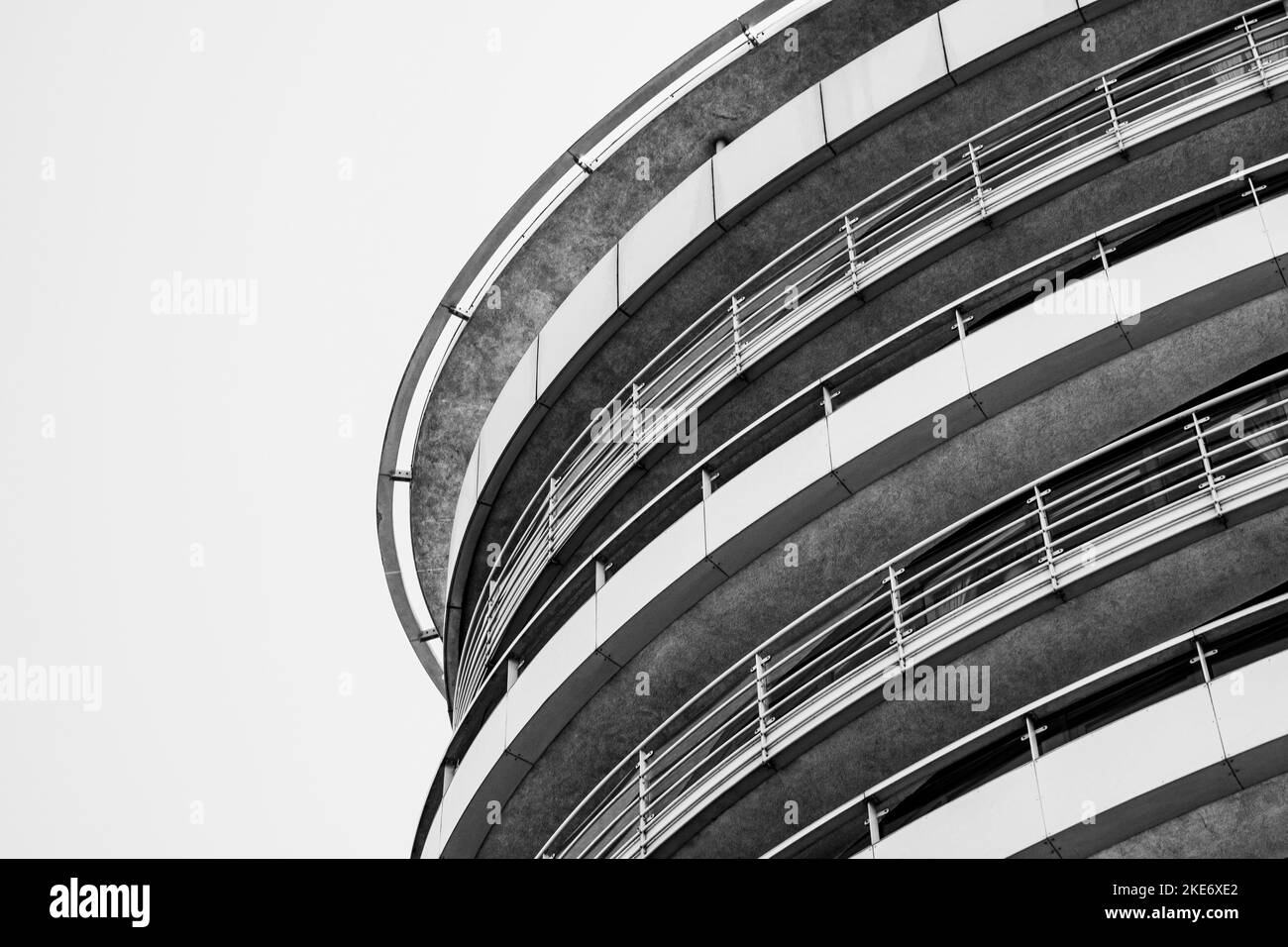 A grayscale of a modern curved building in London during daytime Stock ...