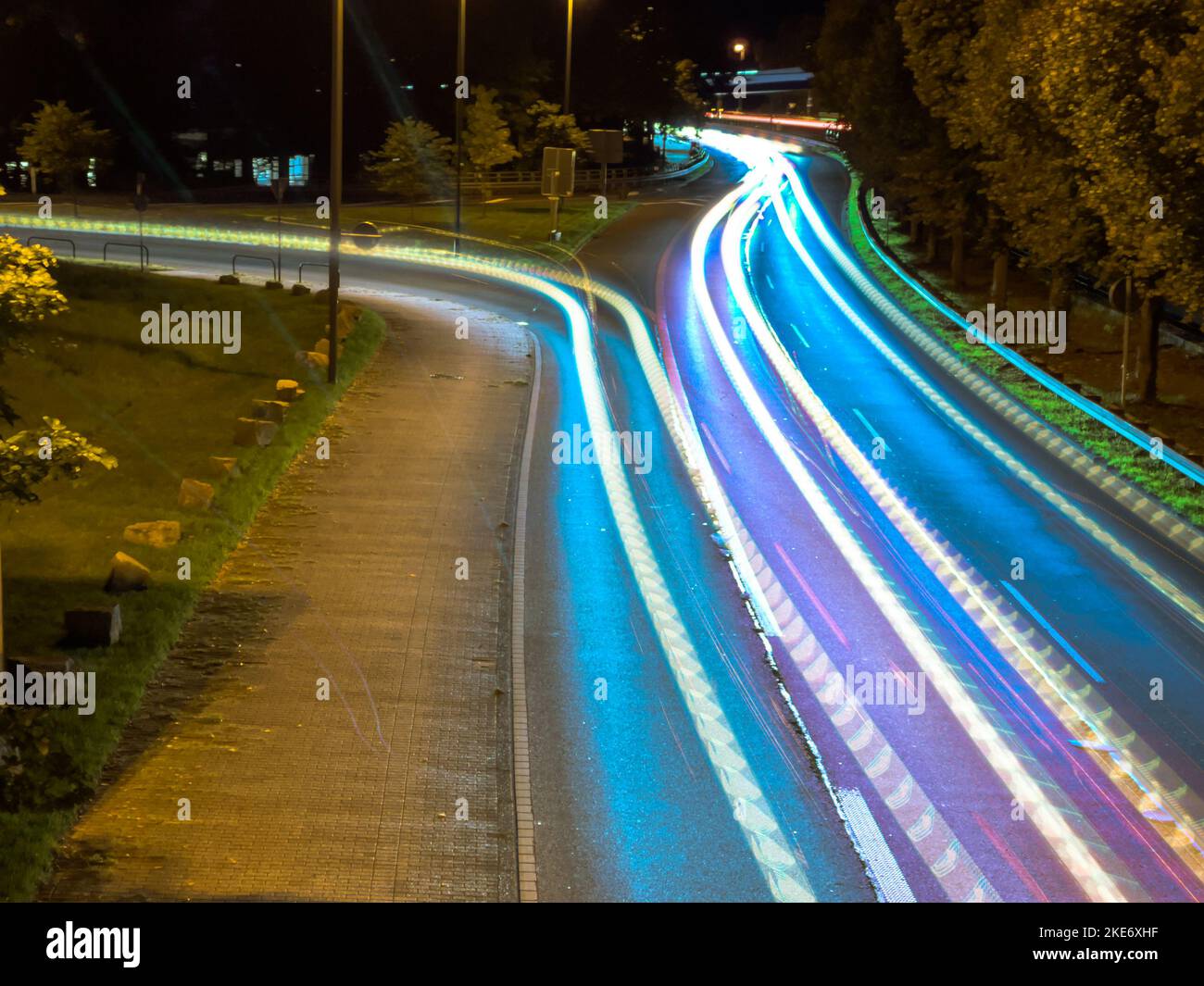 light trails left from traffic on motorway during night Stock Photo - Alamy