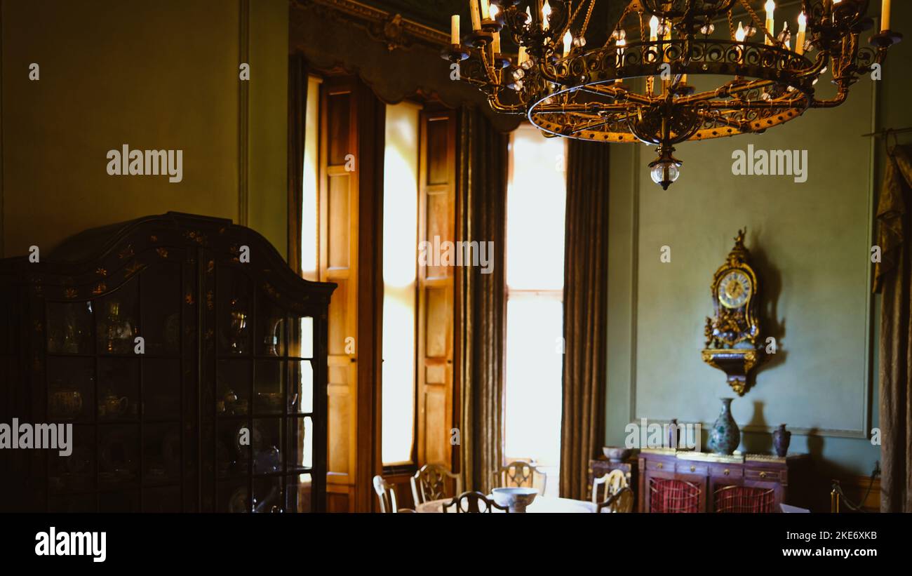 The interior of the Dunster Castle in Minehead England with vintage ...