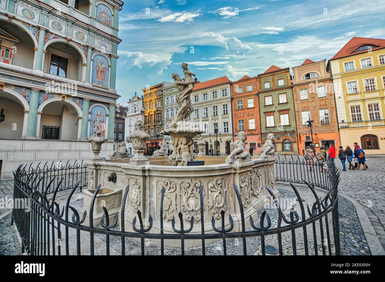 A fountain with a statue on an old market square in daytime Stock Photo ...