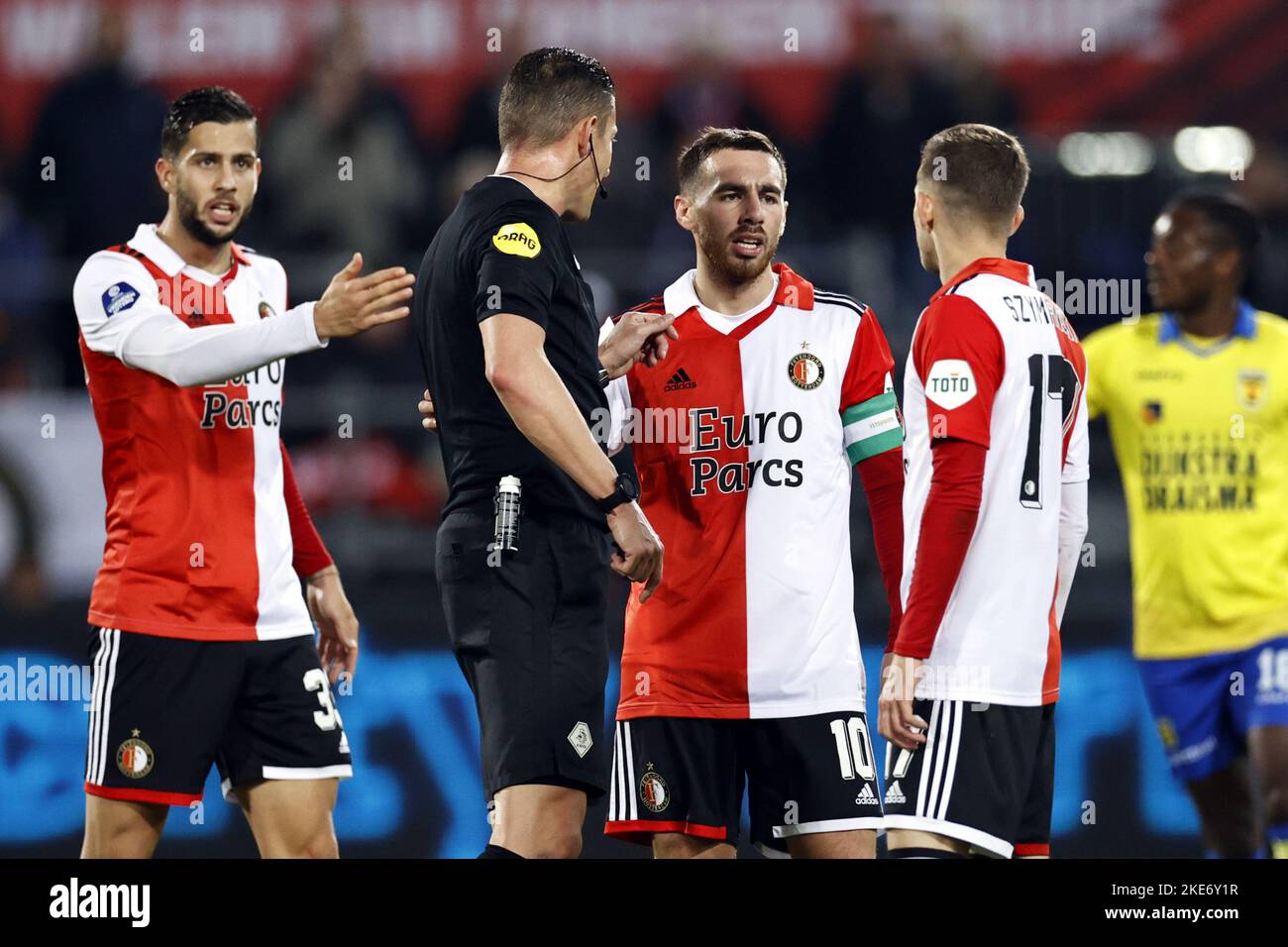 ROTTERDAM - (lr) David Hancko of Feyenoord, referee Jeroen Manschot, Orkun Kokcu of Feyenoord ...