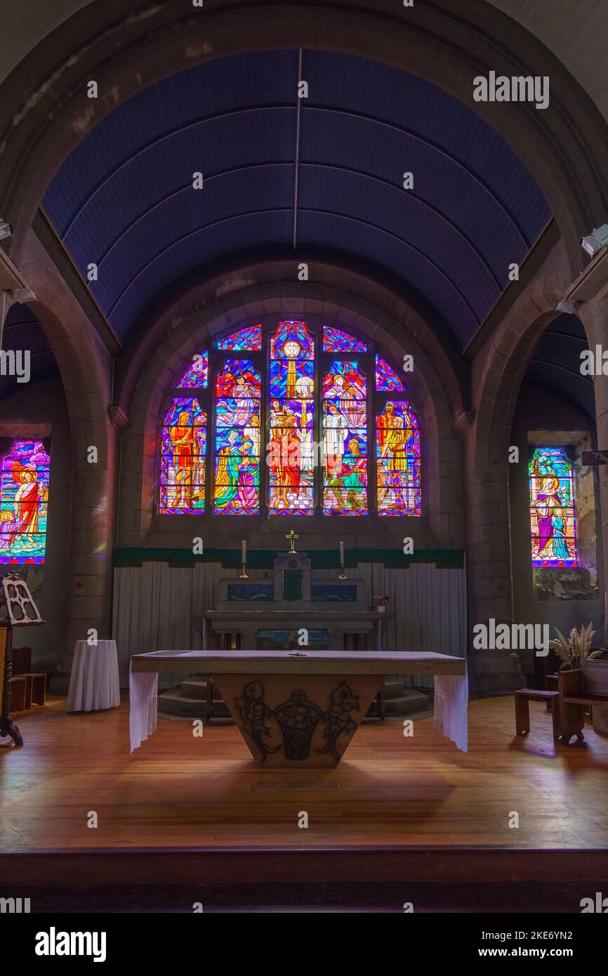 Beautiful old church named Eglise Saint-Remi or St Riok with blue ...