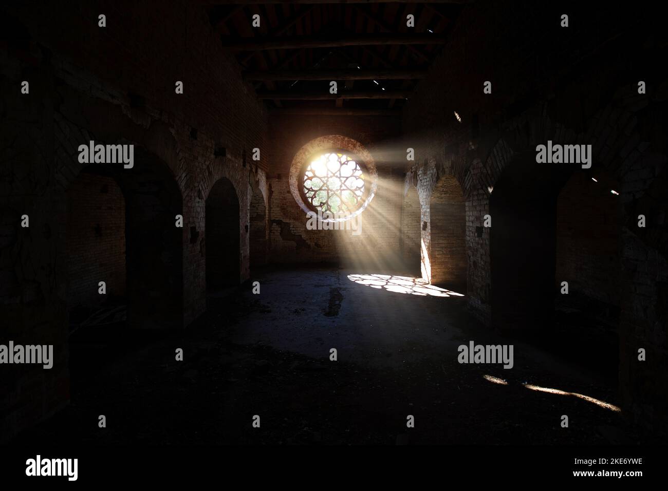 Round stained glass window in old abandoned castle Stock Photo - Alamy