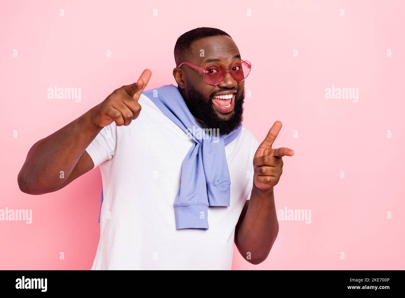 Photo of overjoyed positive attractive man frliting with girl in ...