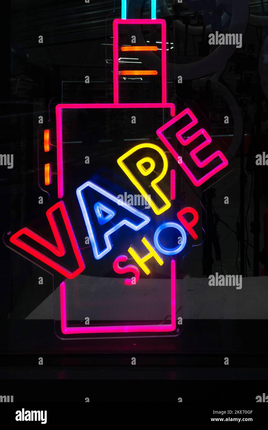 Vape shop sign in a window of a store Stock Photo - Alamy