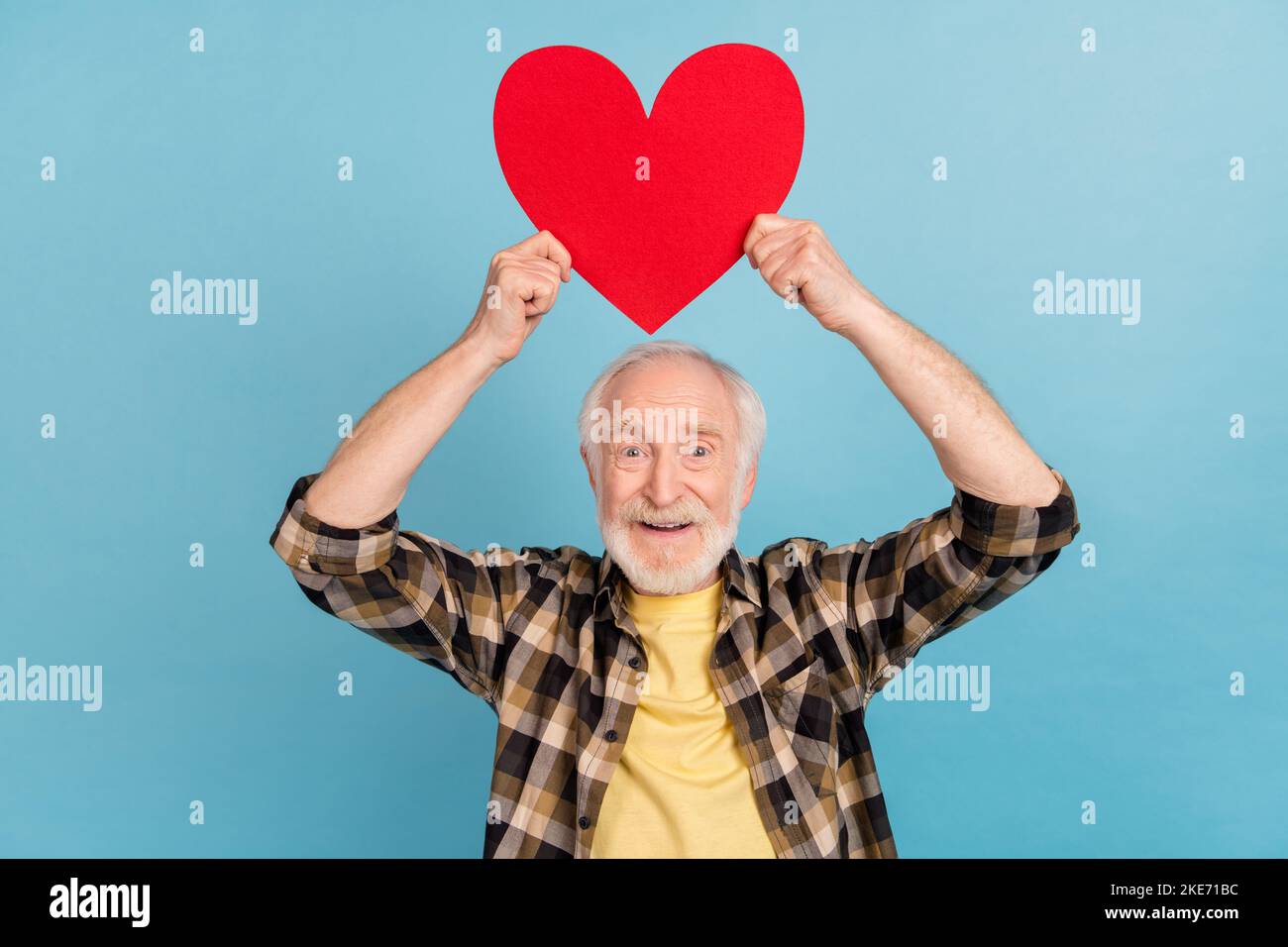 Photo of excited funny retired man wear plaid shirt rising head large ...