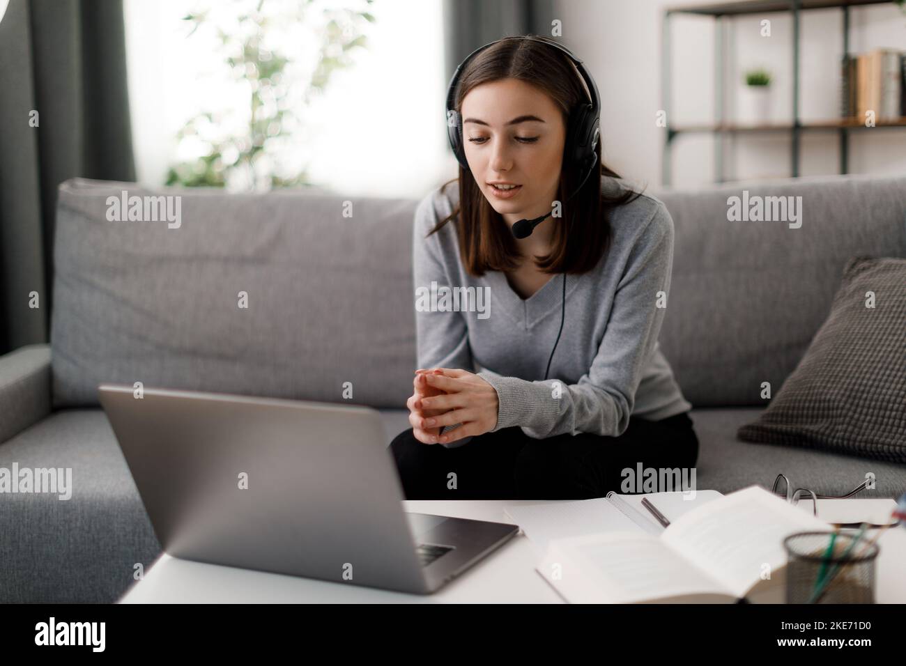 Woman having online lesson Stock Photo - Alamy