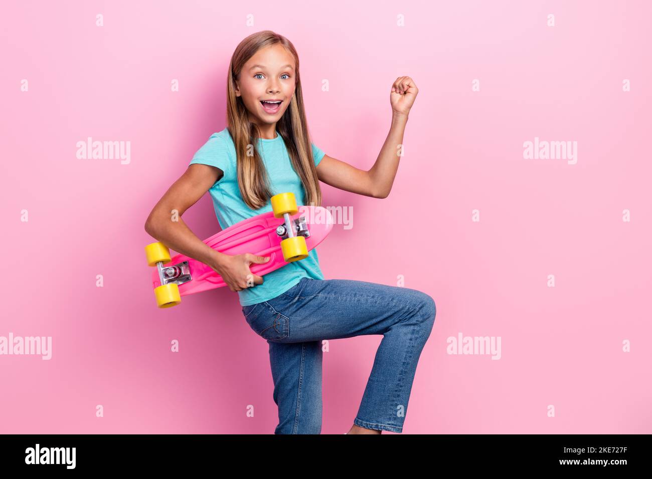 Photo of adorable lucky small kid wear turquoise t-shirt riding ...