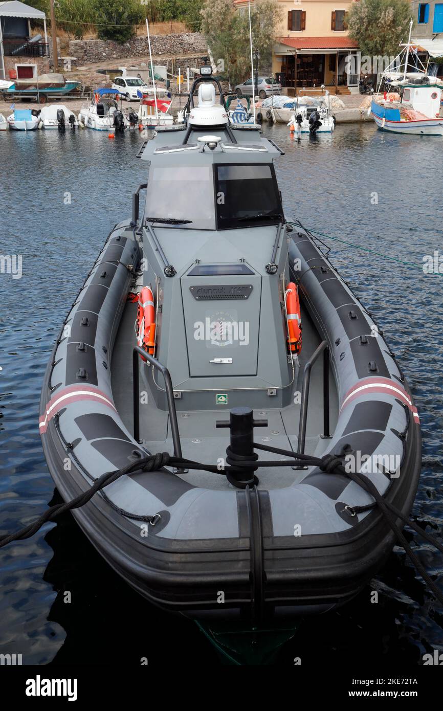 Official looking power boat with insignia. Black and grey. Molyvos ...