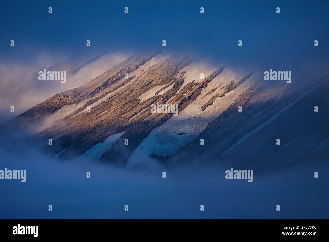 Mt. Saint Helens volcano and her glaciers shine brilliantly in the dawn ...