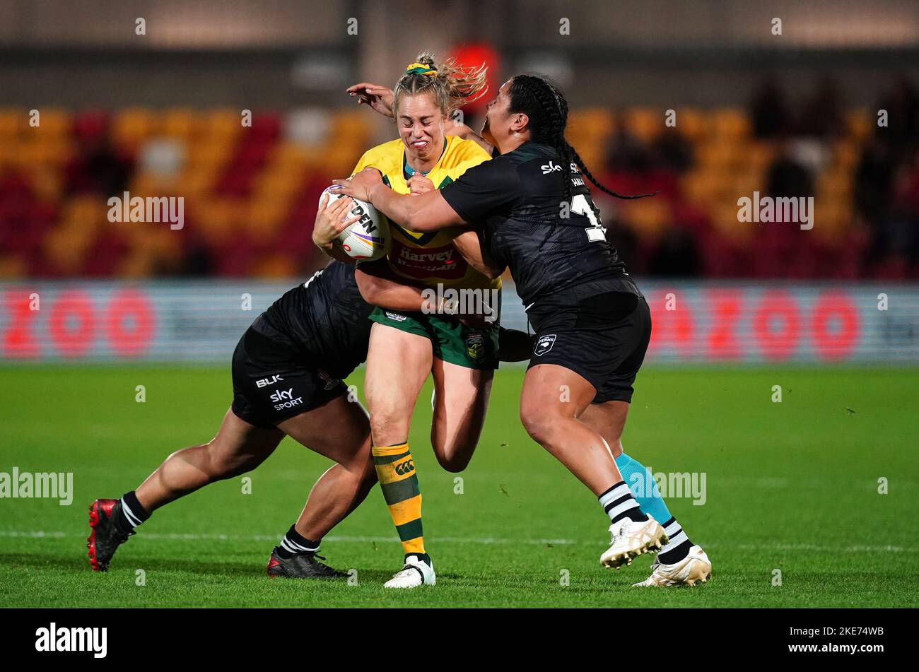 Australia's Kezie Apps is tackled by New Zealand's Annetta Nu'uausala ...