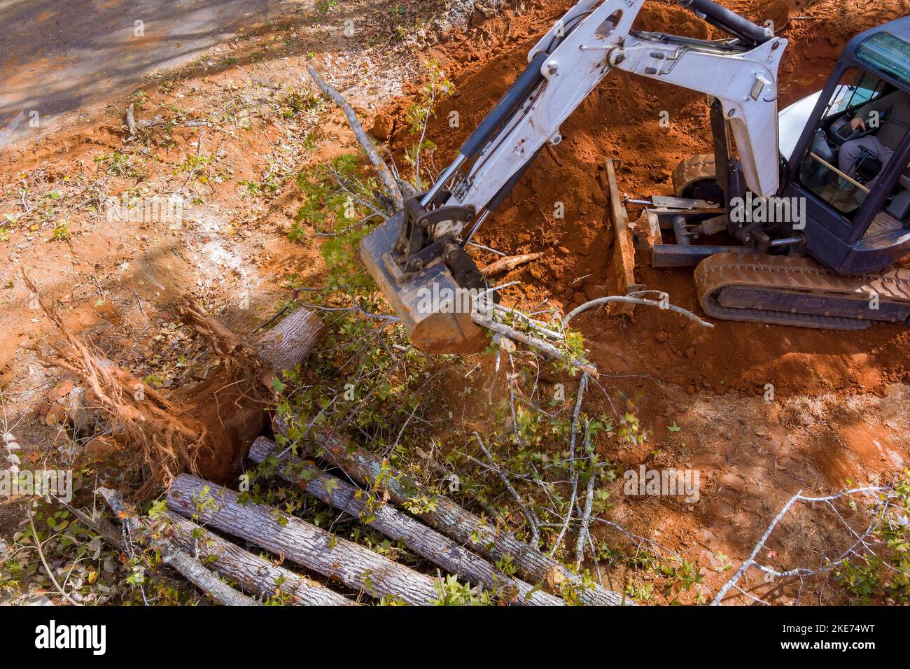 With use tractors skid steers, landscaping works were carried out on ...