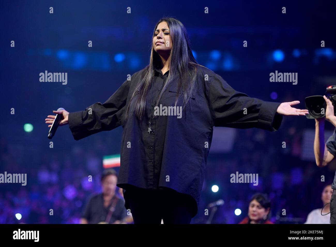Duesseldorf, Germany. 10th Nov, 2022. In tears, Iranian pop singer ...