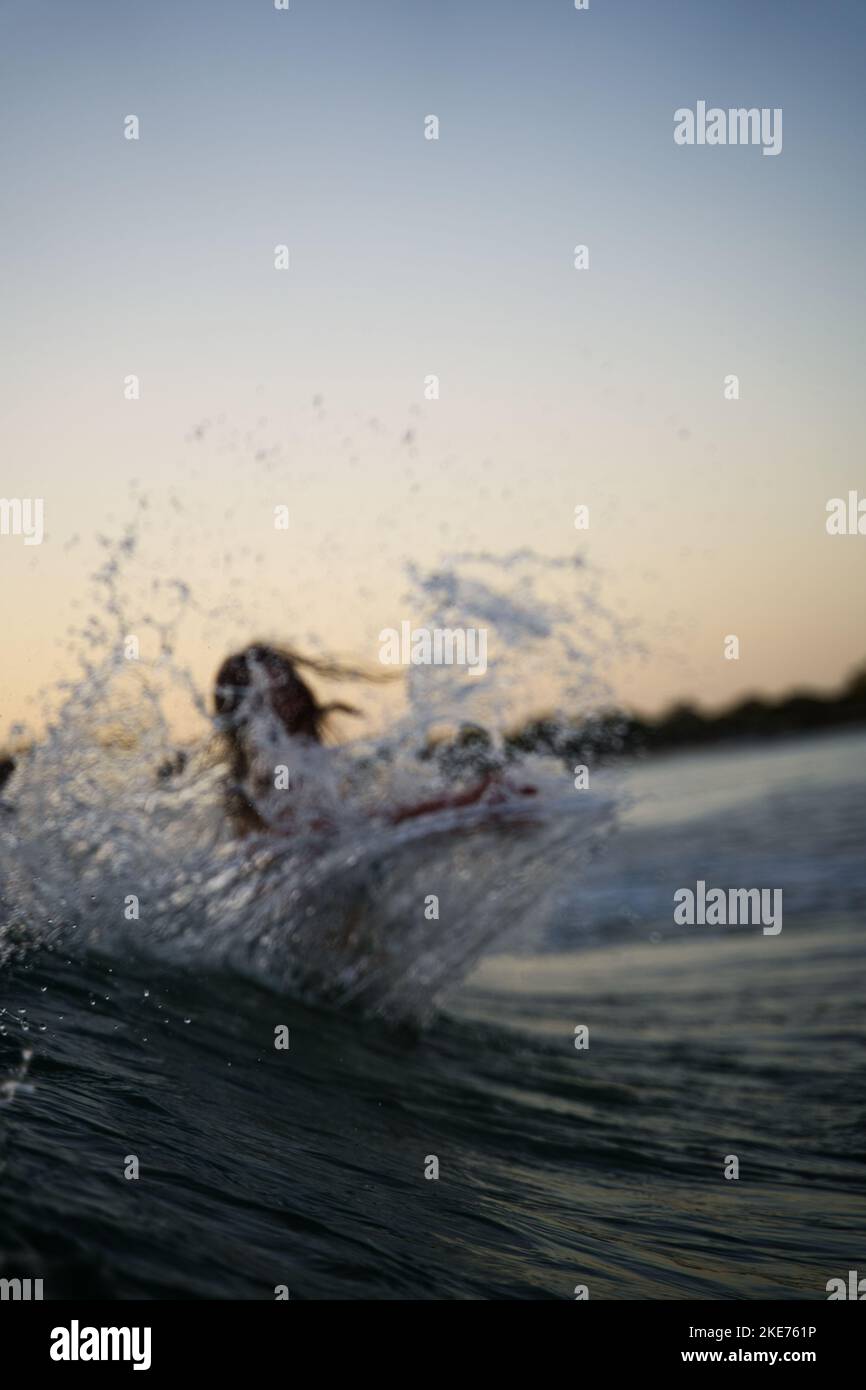 Caught by wave beach hi-res stock photography and images - Alamy