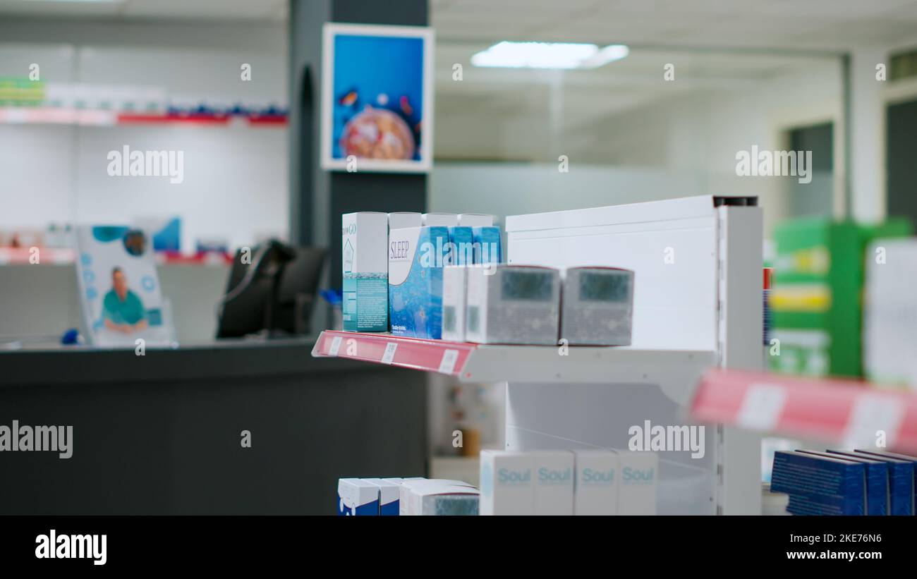 Empty pharmacy store with containers and packages on medicaments ...