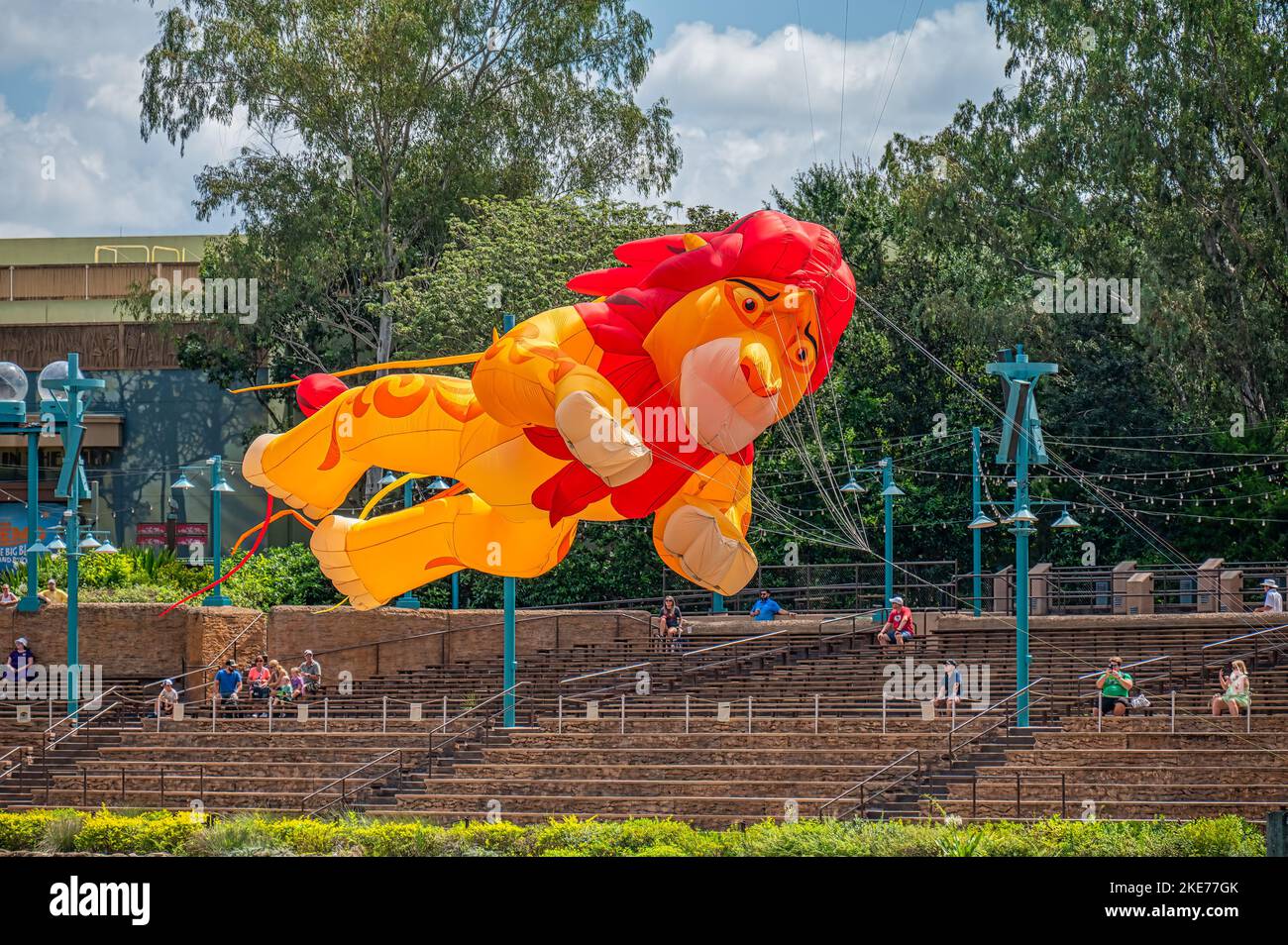 Large lion shaped Kite flying through the air Stock Photo - Alamy