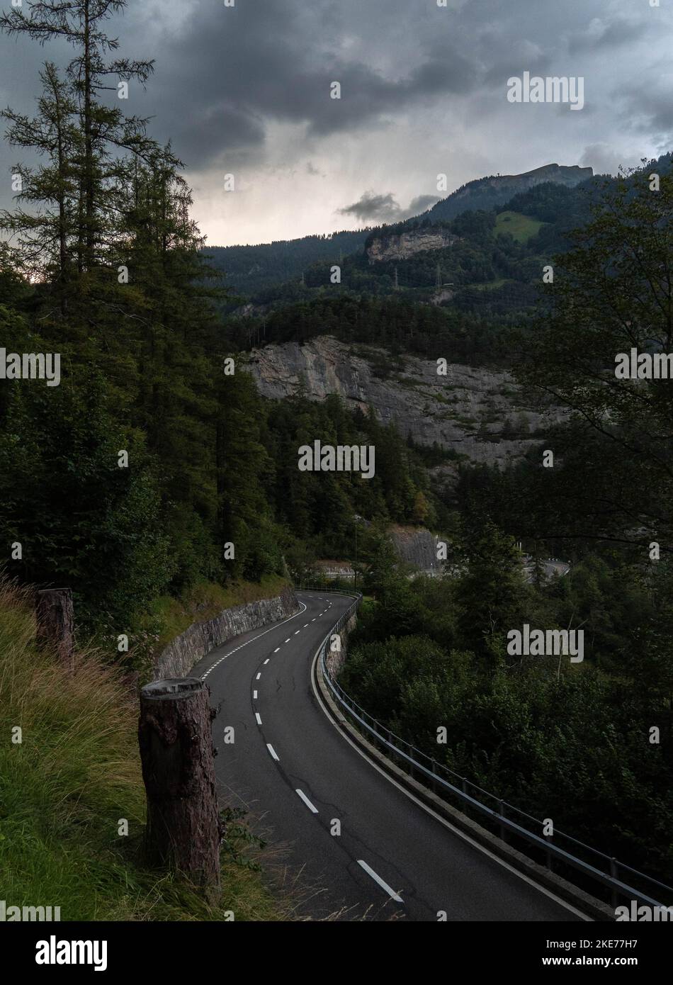 A vertical shot of Susten Pass surrounded by beautiful mountain scenery ...