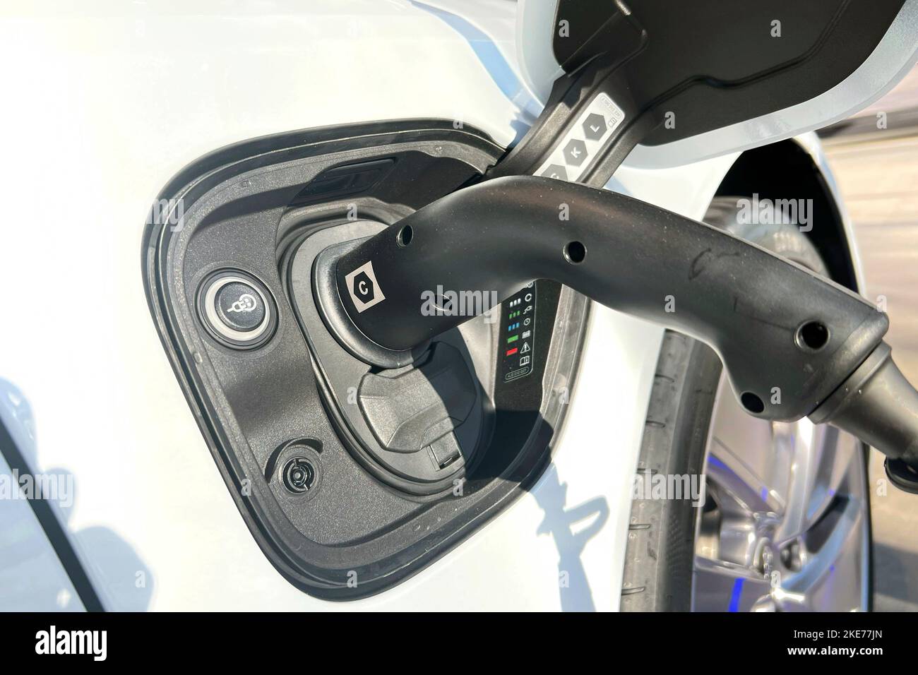 Augsburg, Deutschland. 10th Nov, 2022. E-car is being charged, plug ...