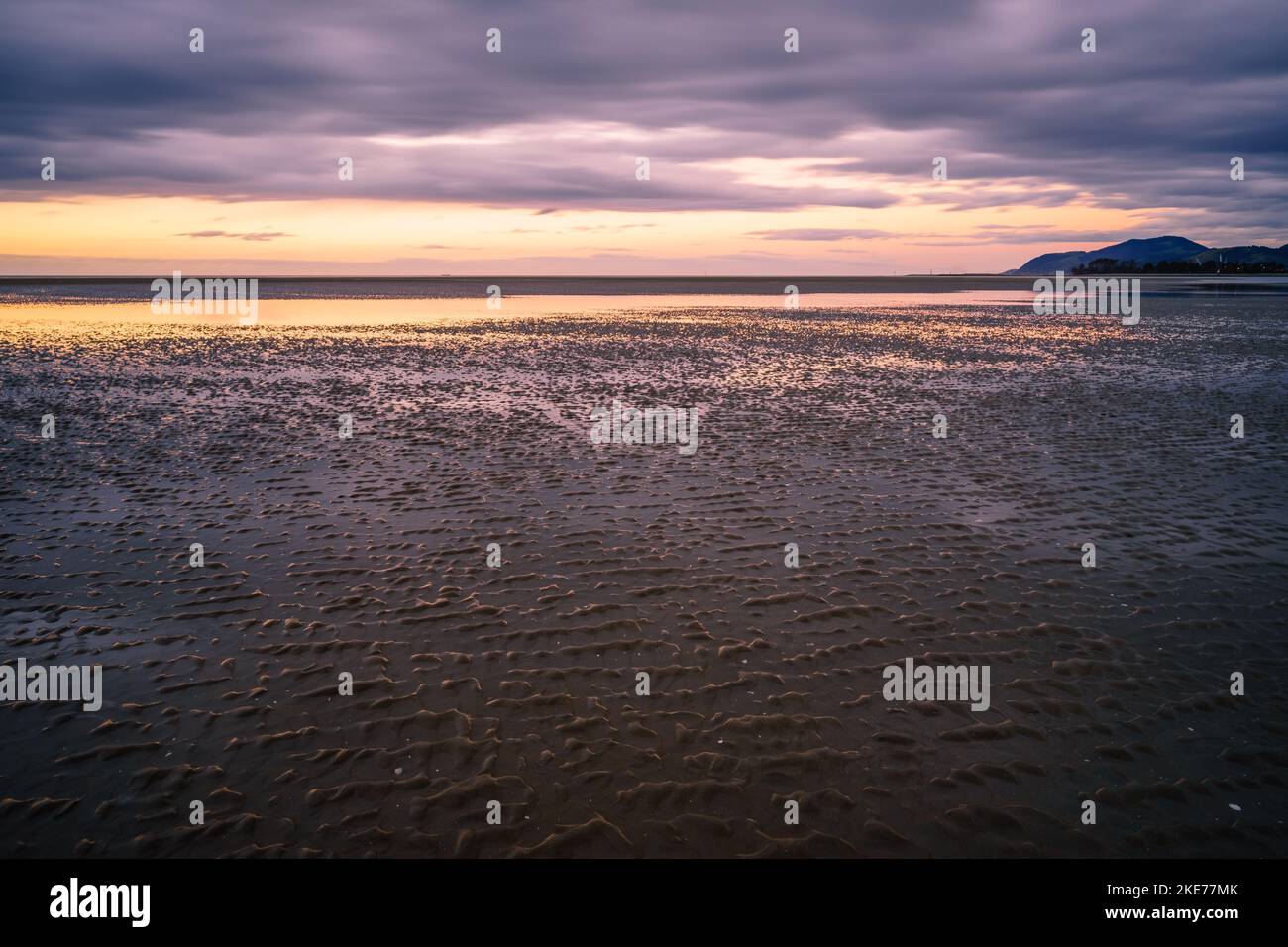The Tahunanui Beach, Nelson, New Zealand at sunset Stock Photo - Alamy