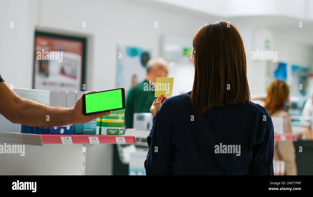 Smartphone showing horizontal greenscreen template in pharmaceutical ...