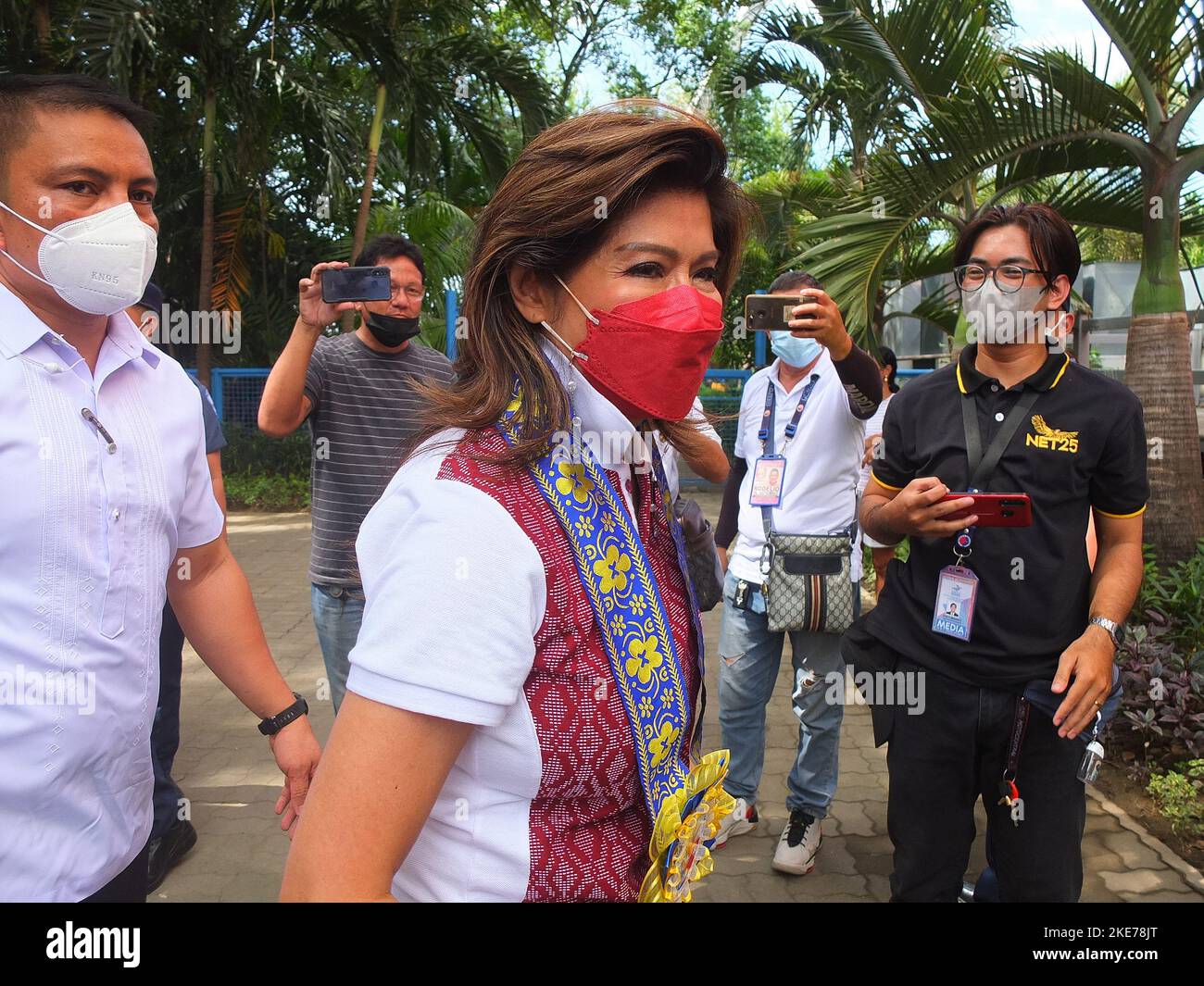Senator Imee Marcos walks towards the Oreta Sports Complex during her ...