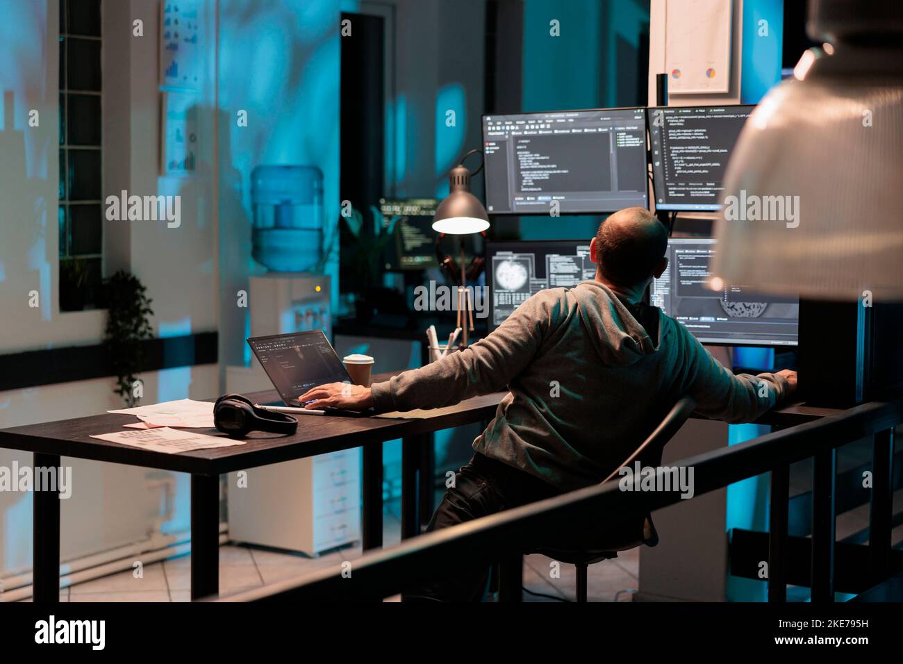 Software Developer Typing Programming Code On Computer With Multiple Monitors Working With Html