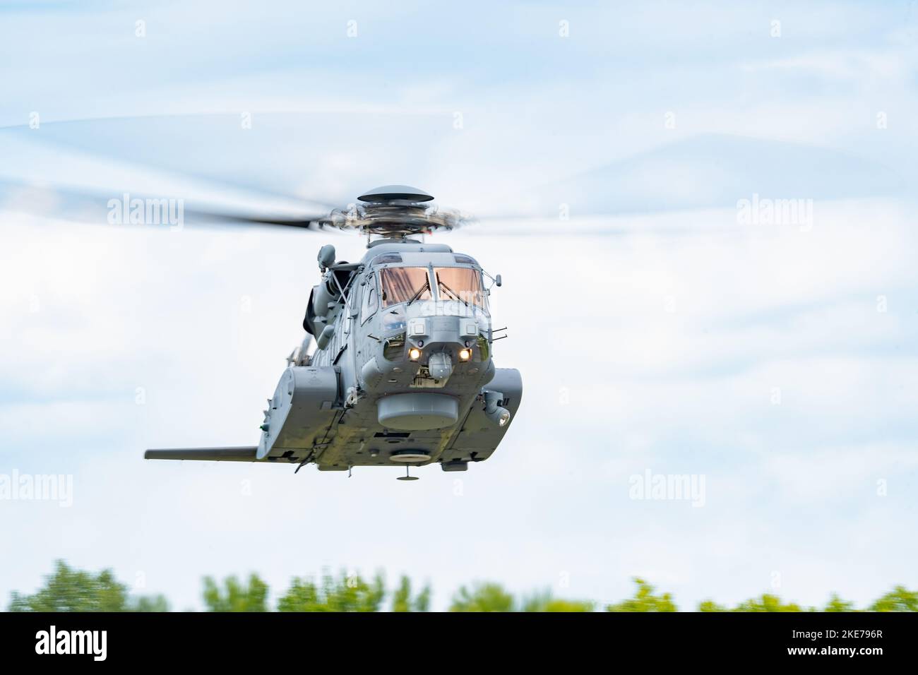 A Royal Canadian Air Force military helicopter hovering during an air ...