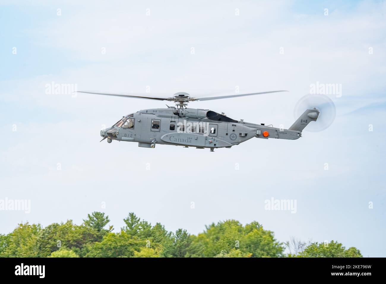 A Royal Canadian Air Force military helicopter hovering during an air ...