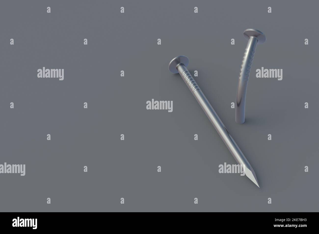 Curved metal nail on gray background. Building equipment. Tool for ...