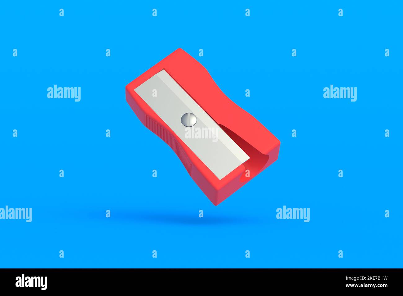 Flying pencil sharpener on blue background. Stationery accessories ...