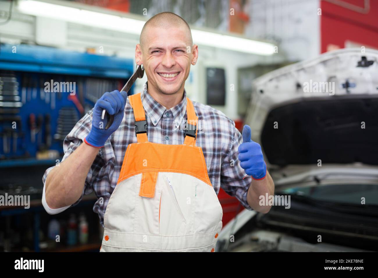 Mechanic standing near car hi-res stock photography and images - Alamy
