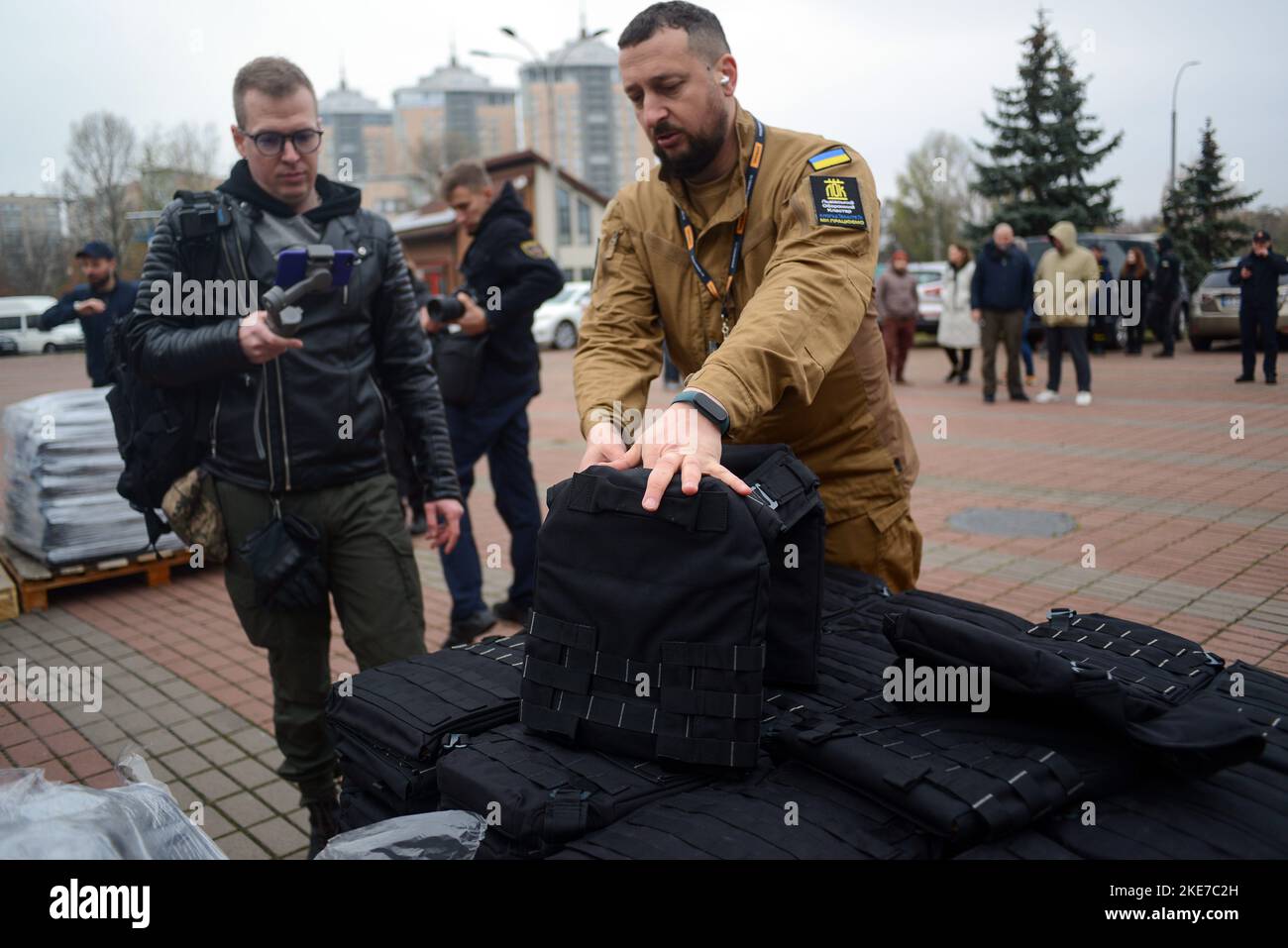 KYIV, UKRAINE - NOVEMBER 10, 2022 - Men examine a batch of bulletproof ...
