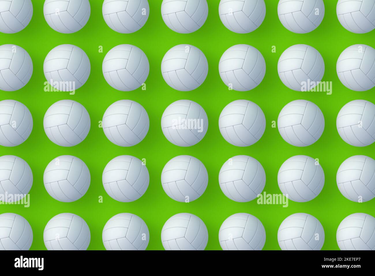 Pattern of volleyball balls on green background. Sports equipment ...