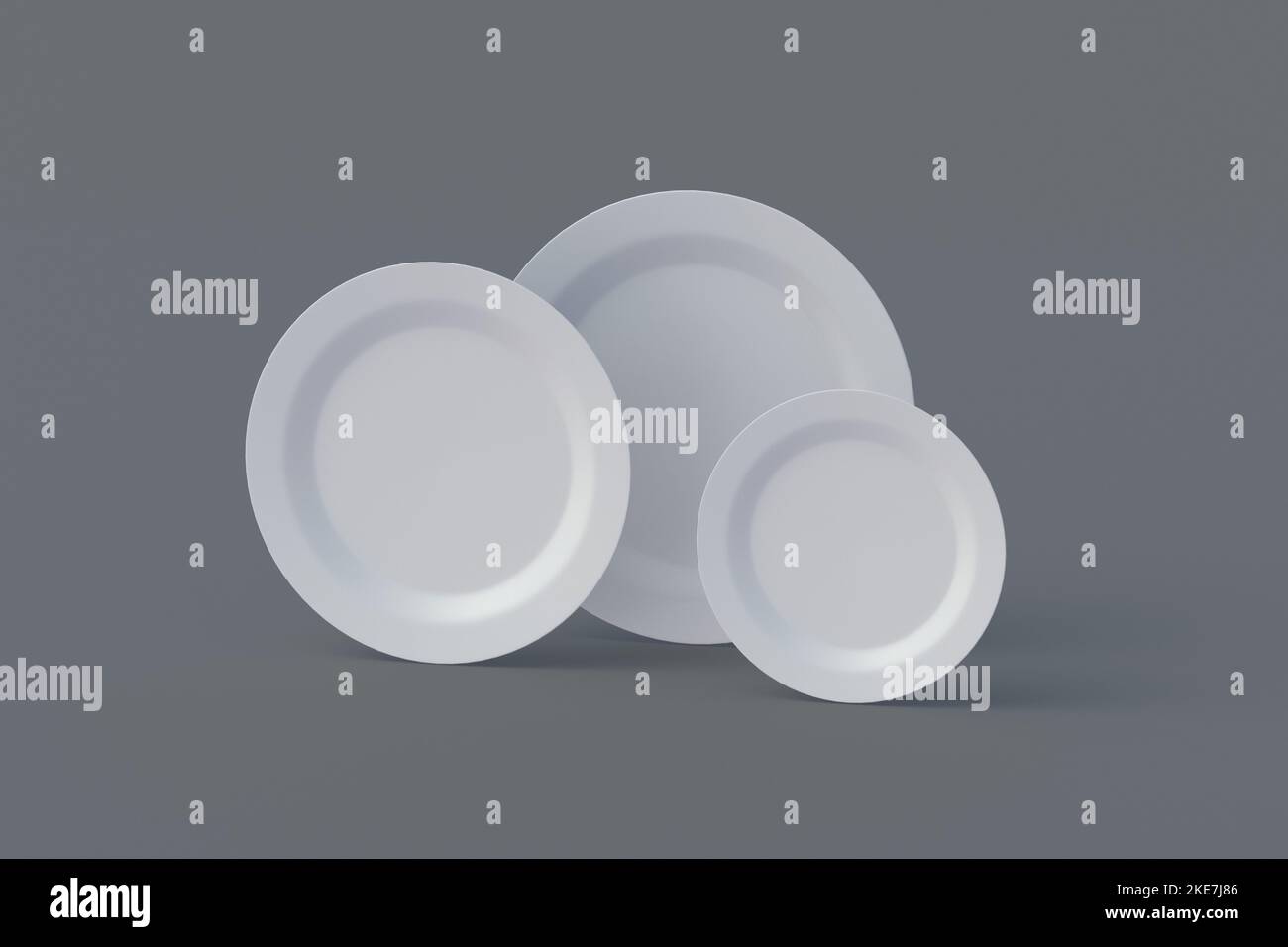 Round plates on gray background. 3d render Stock Photo - Alamy