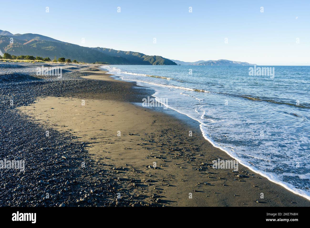 The beautiful sandy and rocky Rarangi beach in New Zealand with the ...