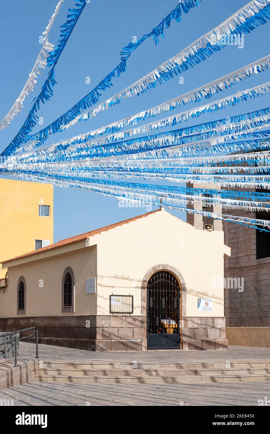 Facade of the church of San Blas with festive blue and white bunting ...