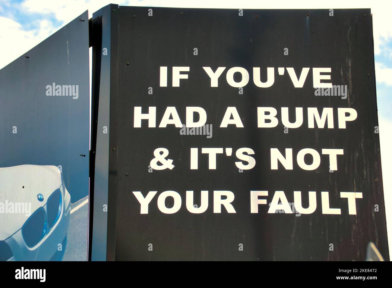 shop sign if you had a bump and it is not your fault Stock Photo - Alamy