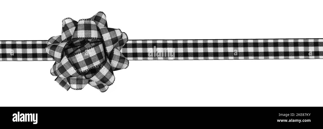 Black and white buffalo plaid Christmas gift bow and ribbon. Long ...
