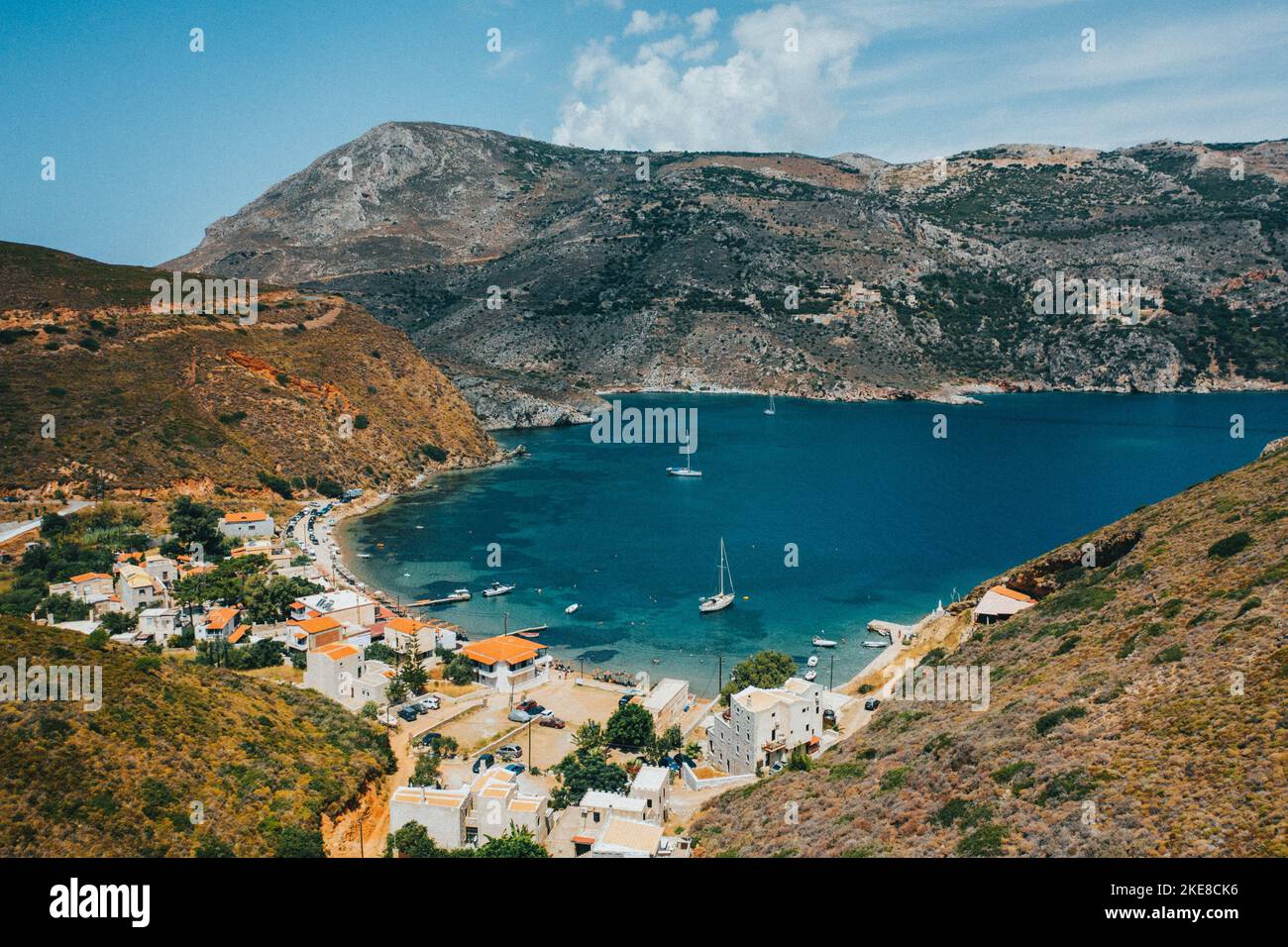 The scenic mountains and blue sea port with sailing boats in Porto ...