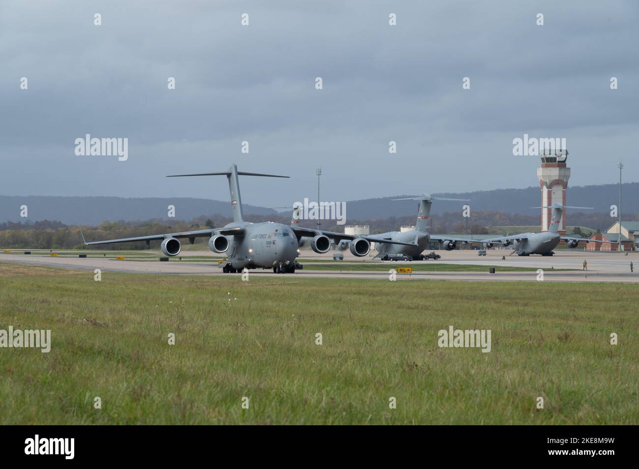 A C-17 Globemaster III aircraft is maneuvered on the taxiway at the ...