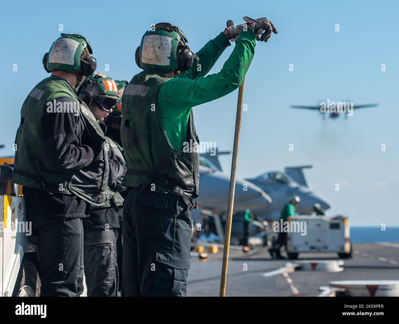 221110-N-UF592-1171 PHILIPPINE SEA (Nov. 10, 2022) Sailors observe as a ...