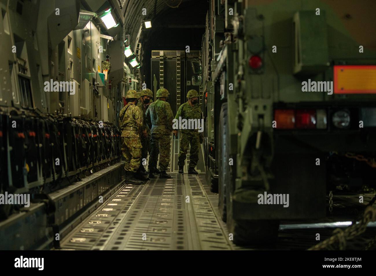 Japan Ground Self-Defense Force members prepare to unload two JGSDF ...