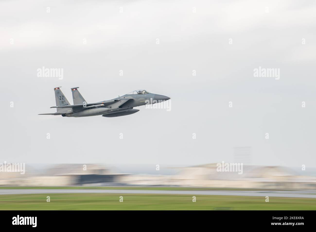 An F-15C Eagle takes off from a flight line at Kadena Air Base, Japan ...