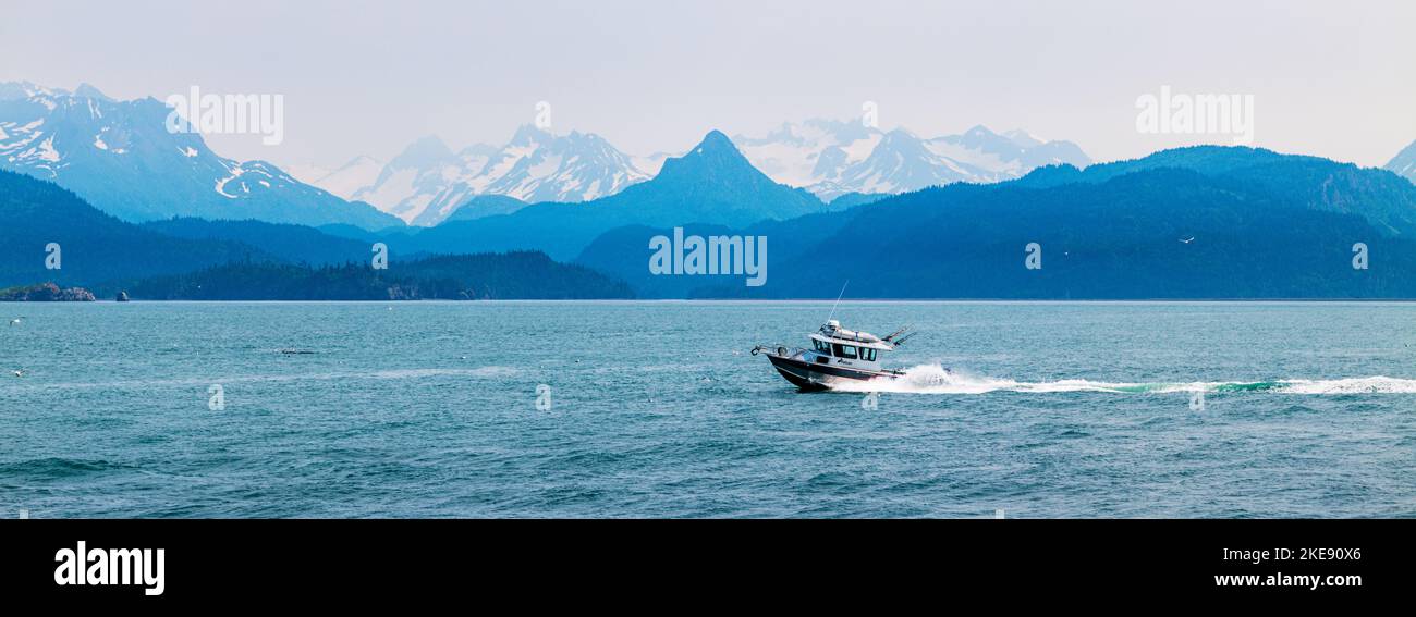 Panorama view of fishing boat; foggy; misty; view of Kachemak Bay ...