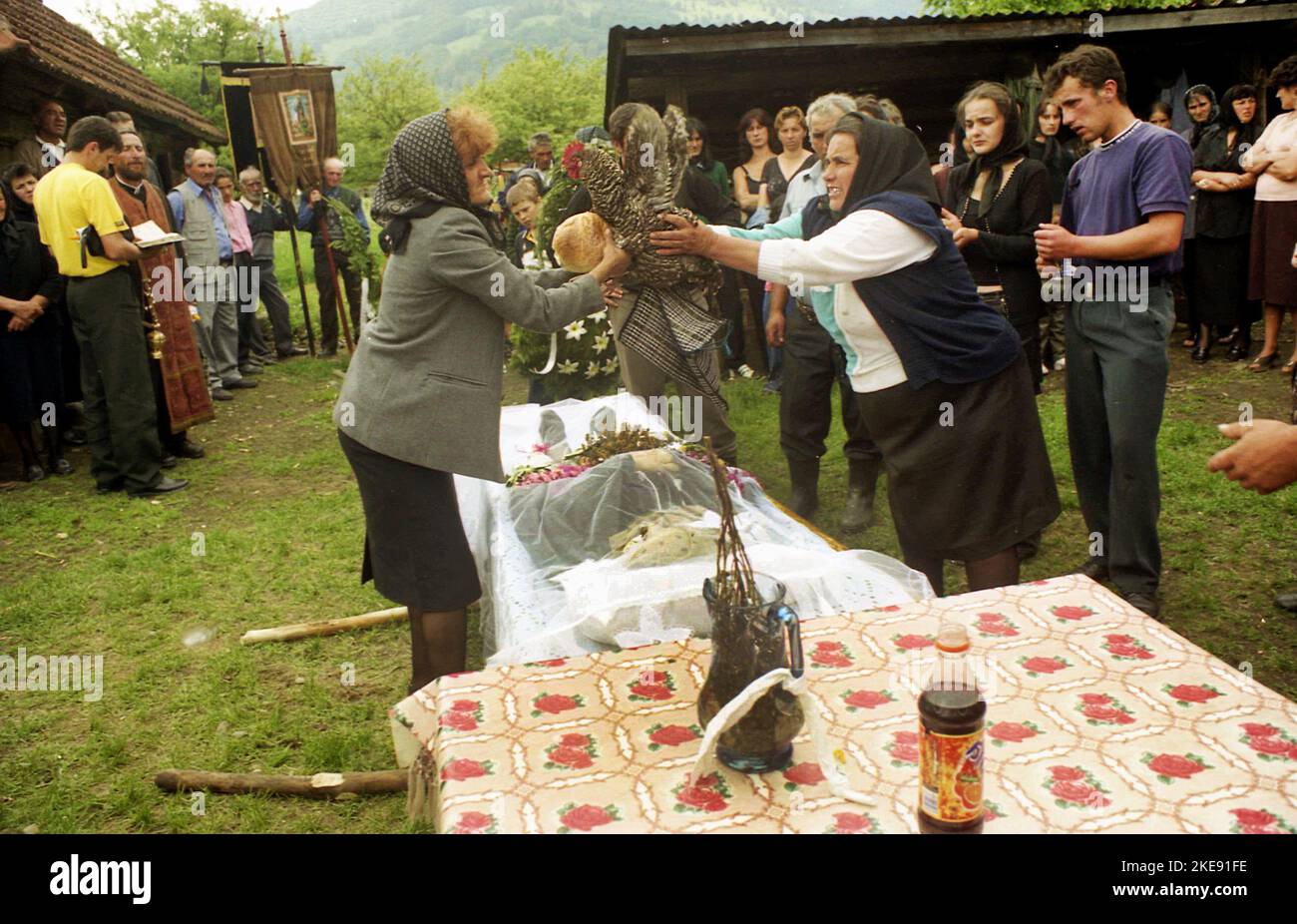 Hunedoara County, Romania, 2003. The Momarlani community burying their ...