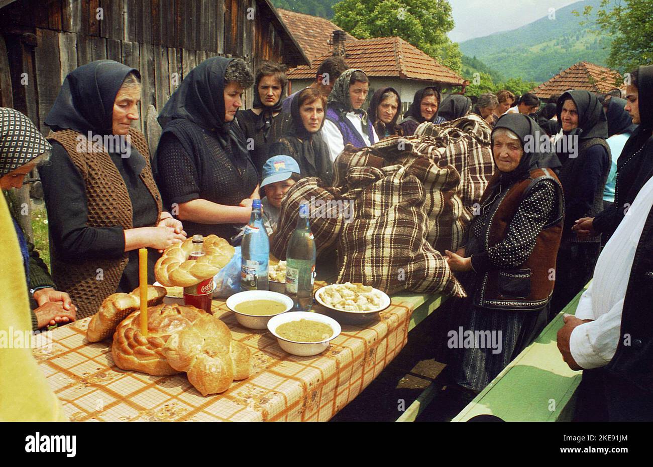 Hunedoara County, Romania, 2003. The Momarlani community burying their ...