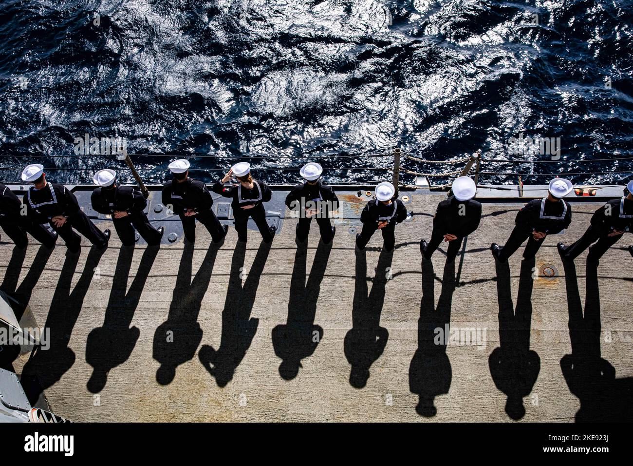 Japan. 6th Nov, 2022. Sailors stand at parade rest on the starboard ...